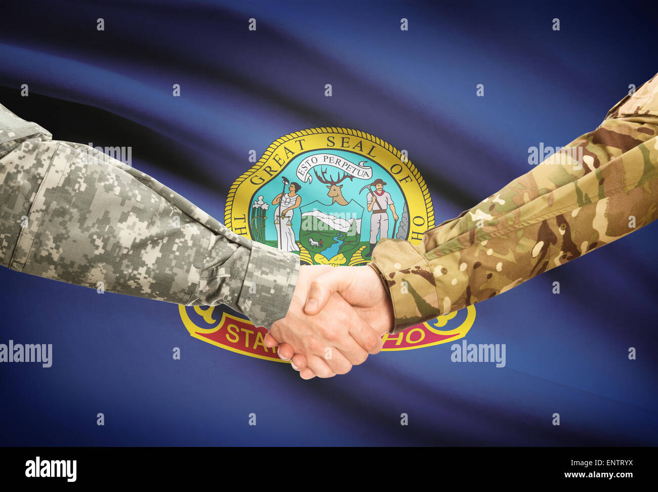 Soldiers handshake and US state flag - Idaho Stock Photo - Alamy