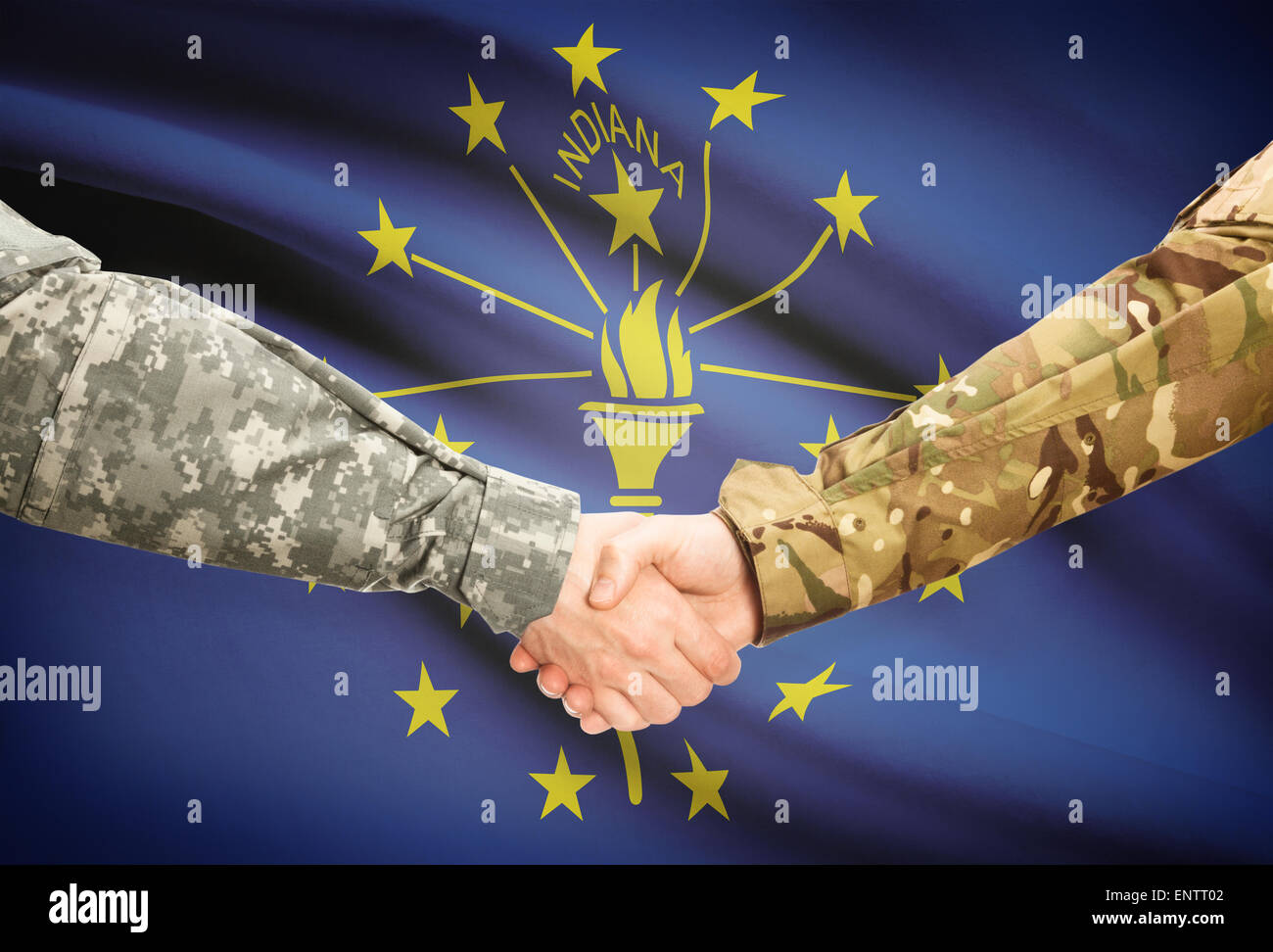 Soldiers handshake and US state flag - Indiana Stock Photo - Alamy