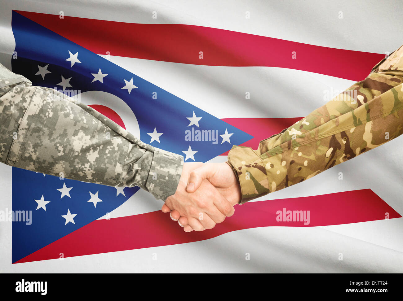 Soldiers handshake and US state flag - Ohio Stock Photo - Alamy