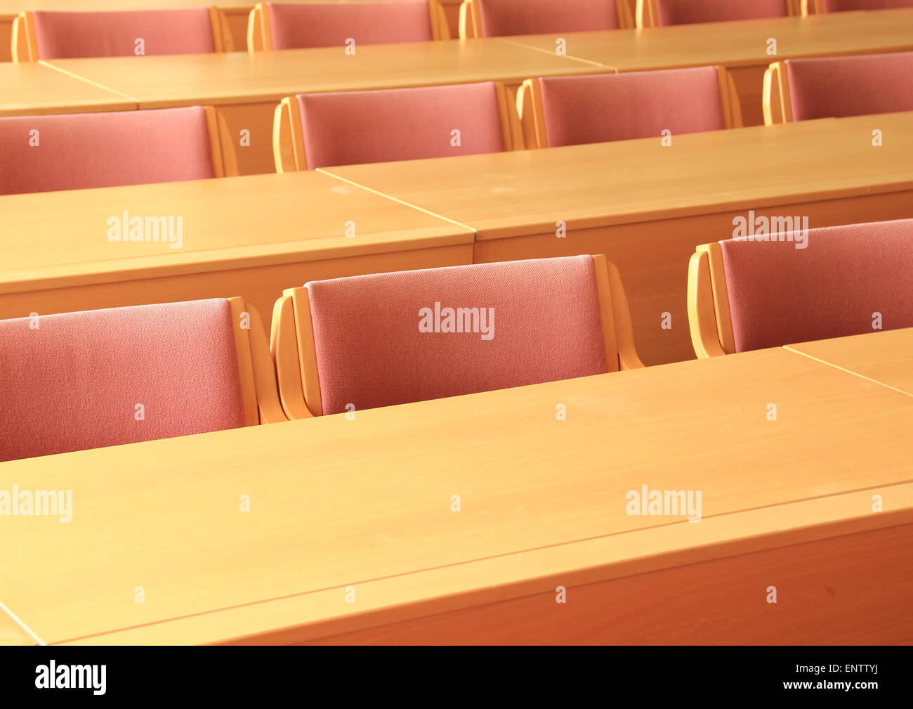 Empty conference room with wooden chairs facing front Stock Photo - Alamy