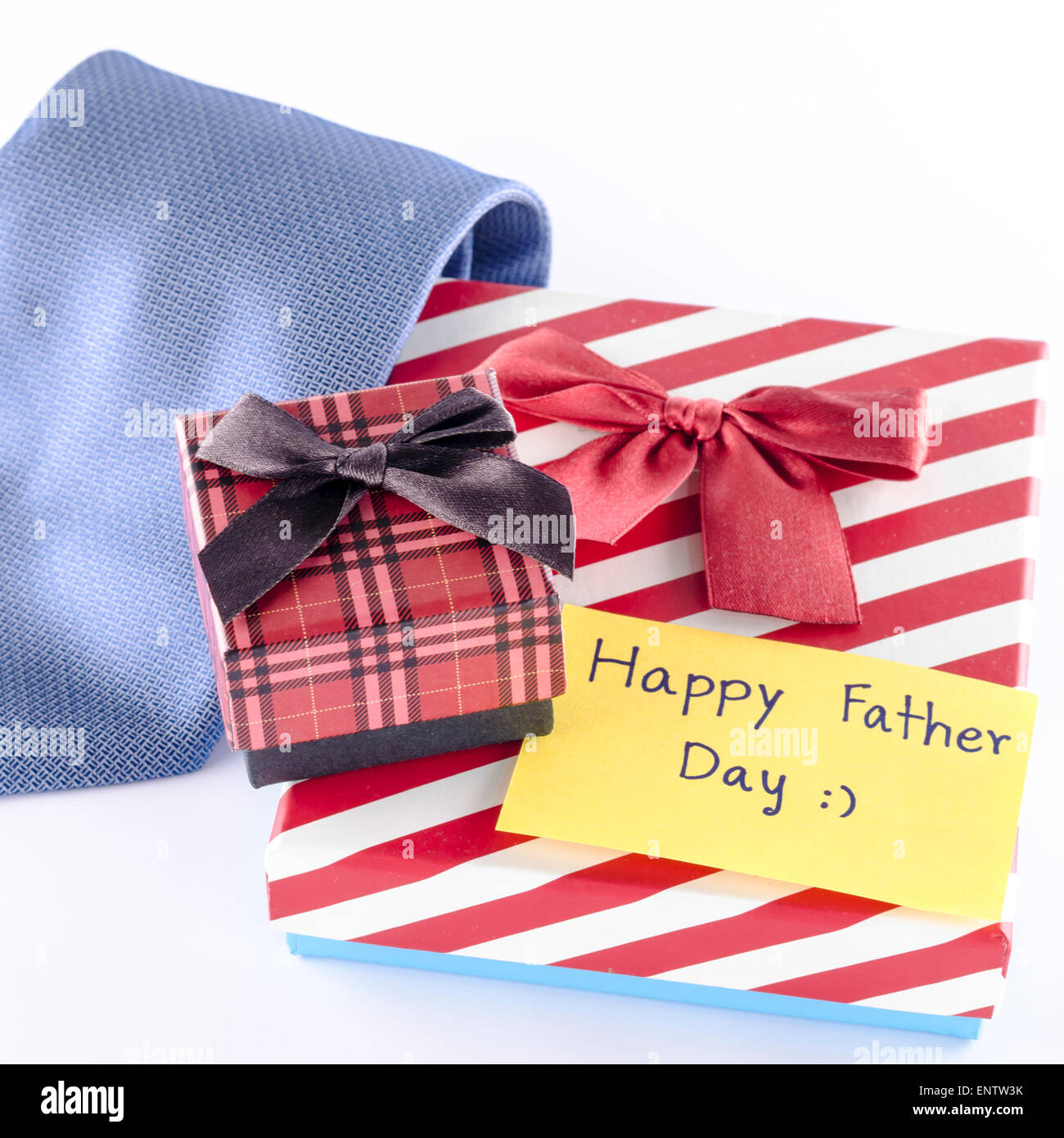 neck tie and two gift boxes with card tag write happy father day word ...