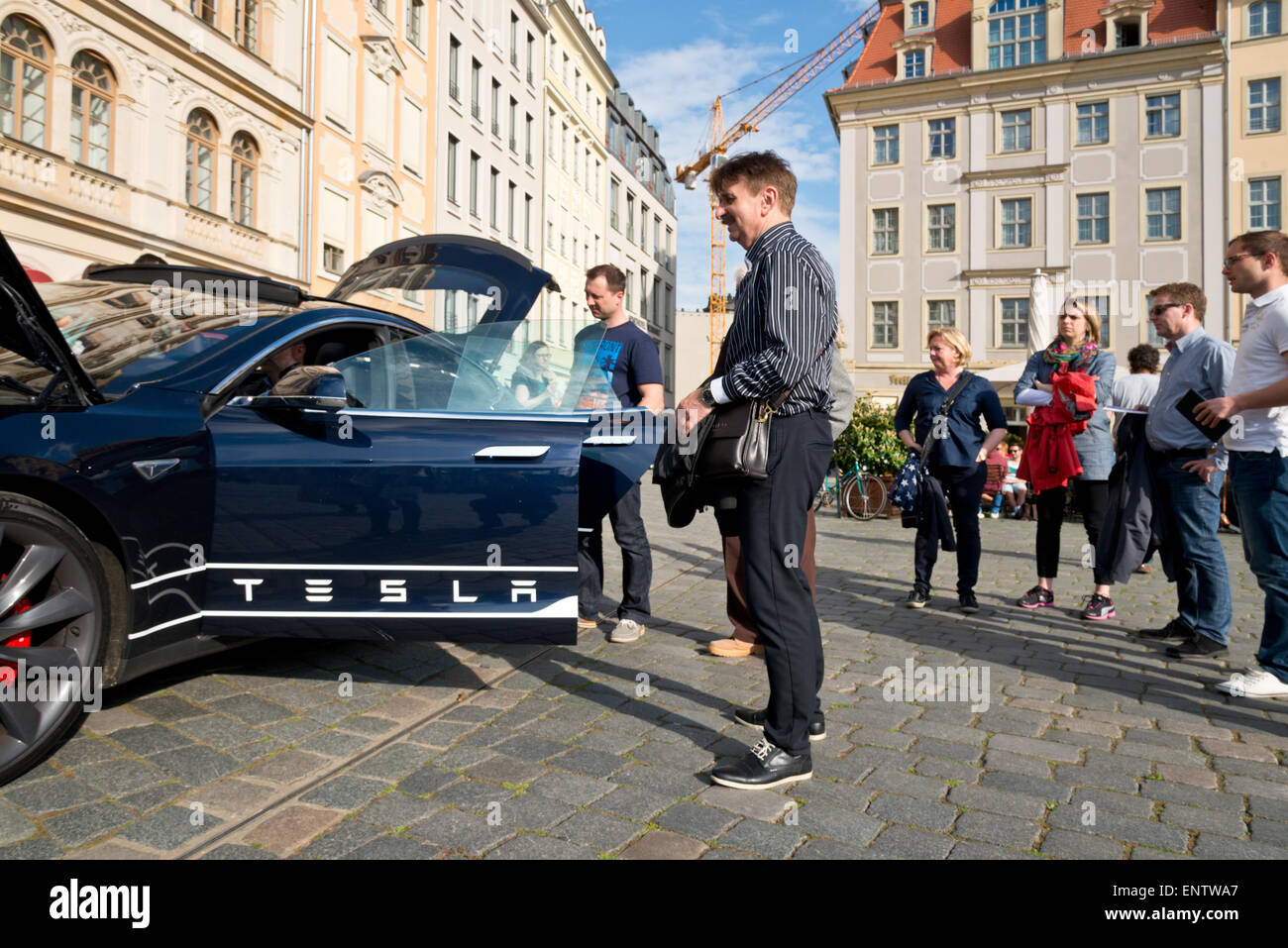 People watching at new electric car TESLA in centre of Dresden, May 8 ...