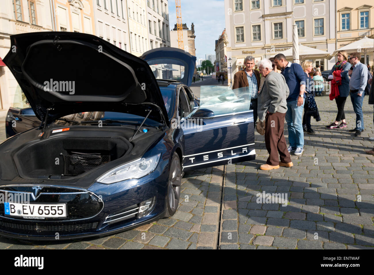 People watching at new electric car TESLA in centre of Dresden, May 8 ...