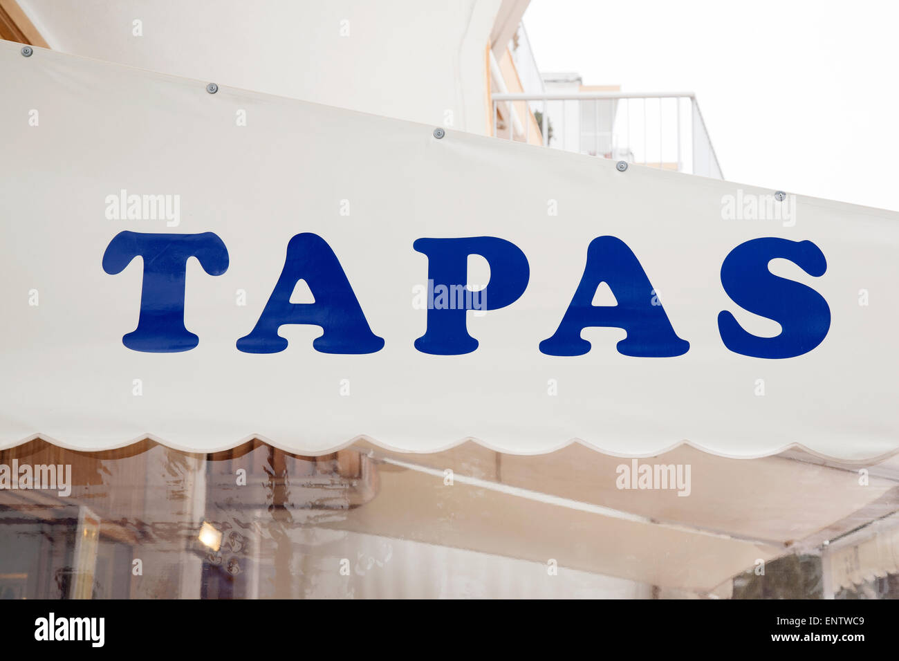 Blue Tapas Sign in Urban Setting Stock Photo - Alamy