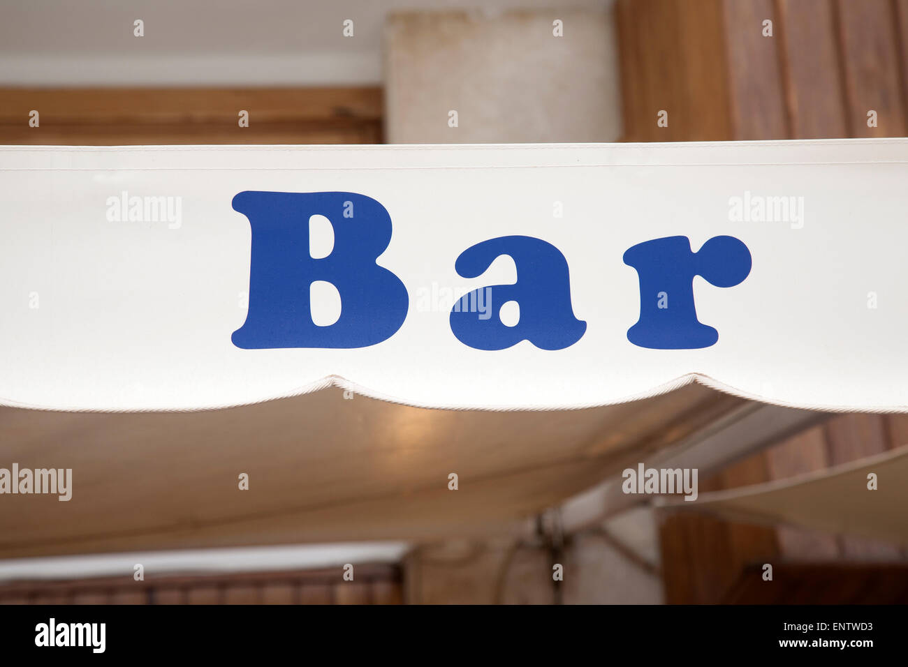 Blue Bar Sign in Urban Setting Stock Photo - Alamy