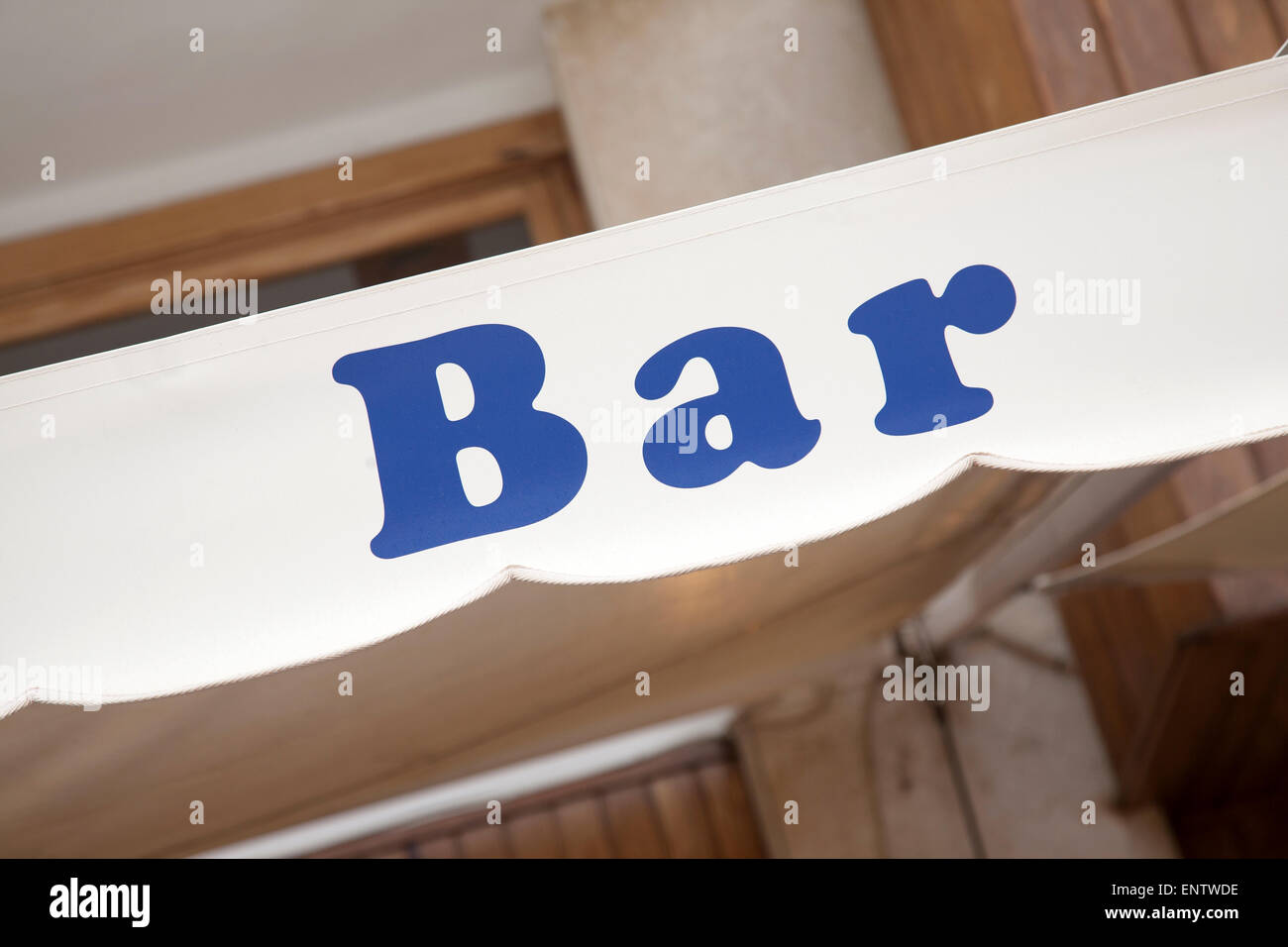 Blue Bar Sign in Urban Setting Stock Photo - Alamy