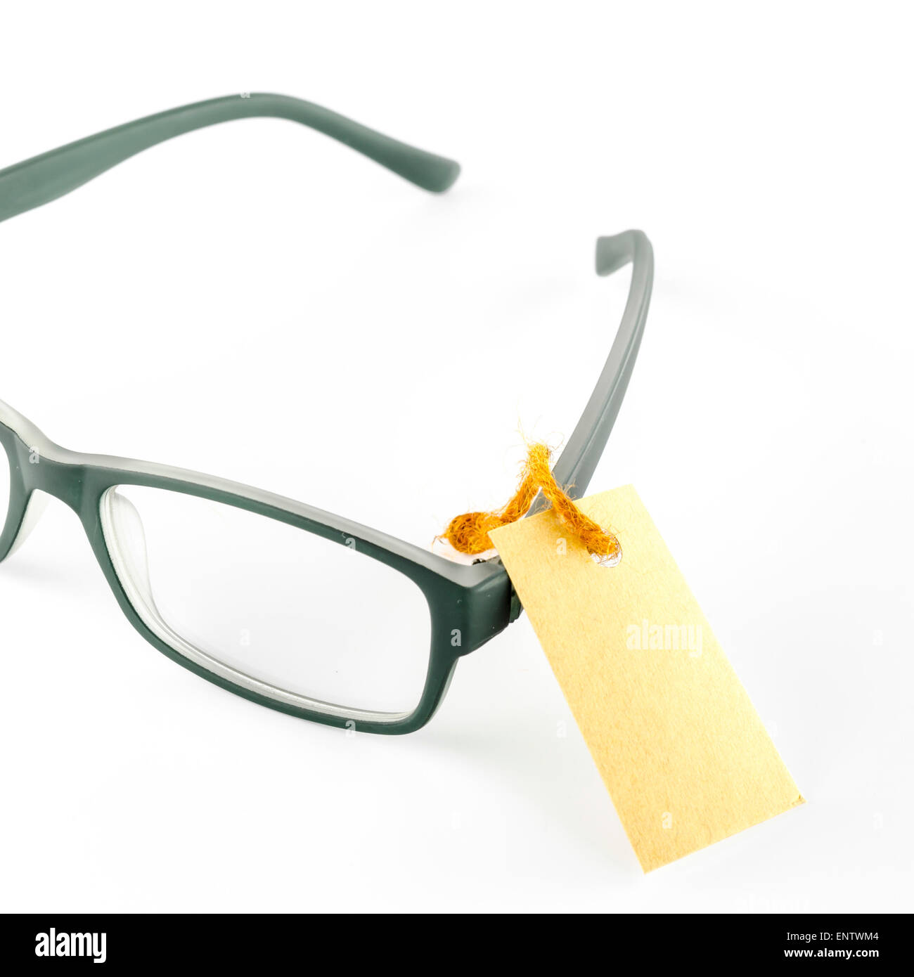 glasses and cost tag on a white background Stock Photo - Alamy