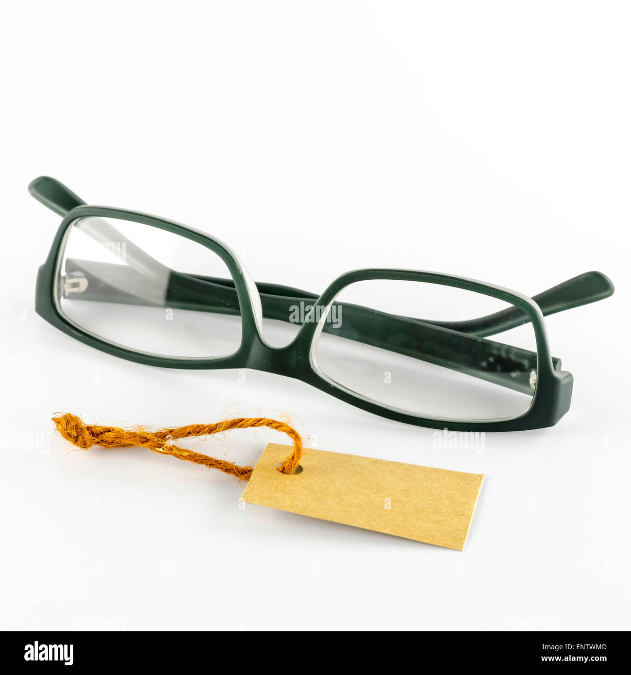 glasses and cost tag on a white background Stock Photo - Alamy