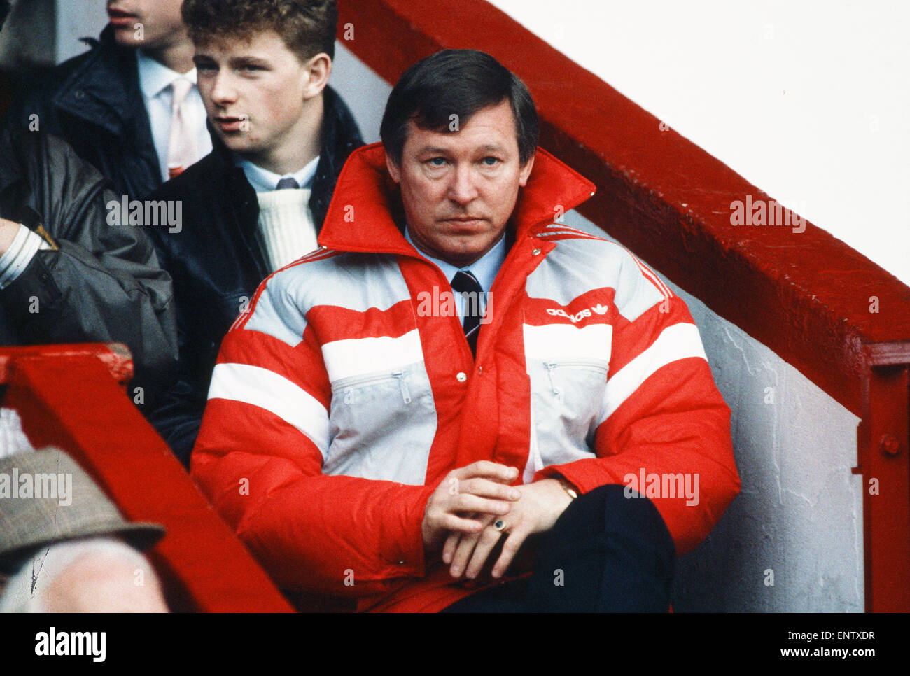 Manchester United manager Alex Ferguson watches his team in action ...