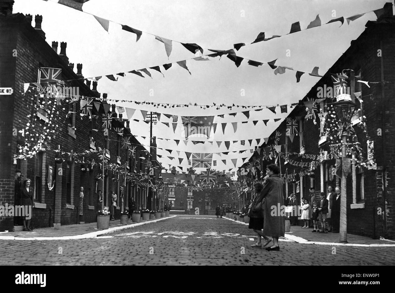 A Manchester street decked out with coronation decorations in ...