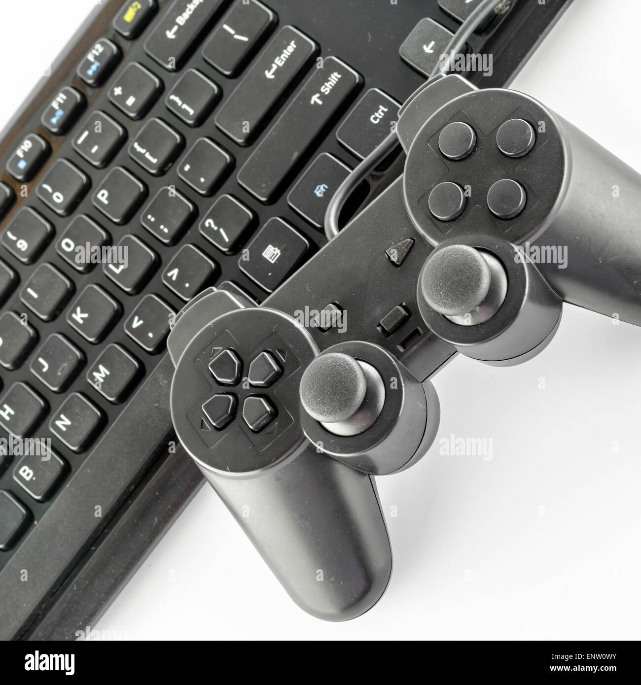 keyboard computer and game controller on a white background Stock Photo ...