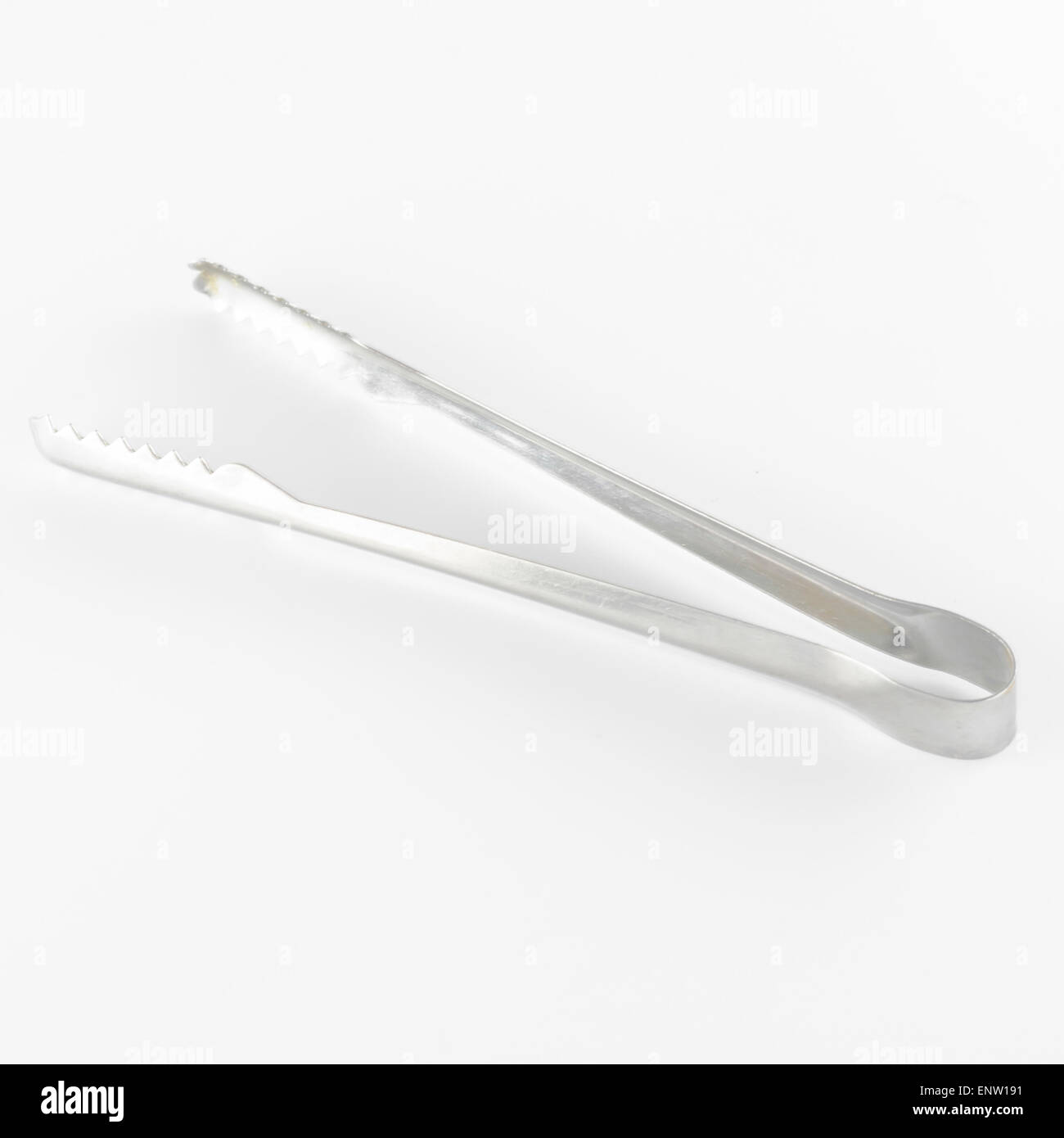 ice tongs on a white background Stock Photo - Alamy
