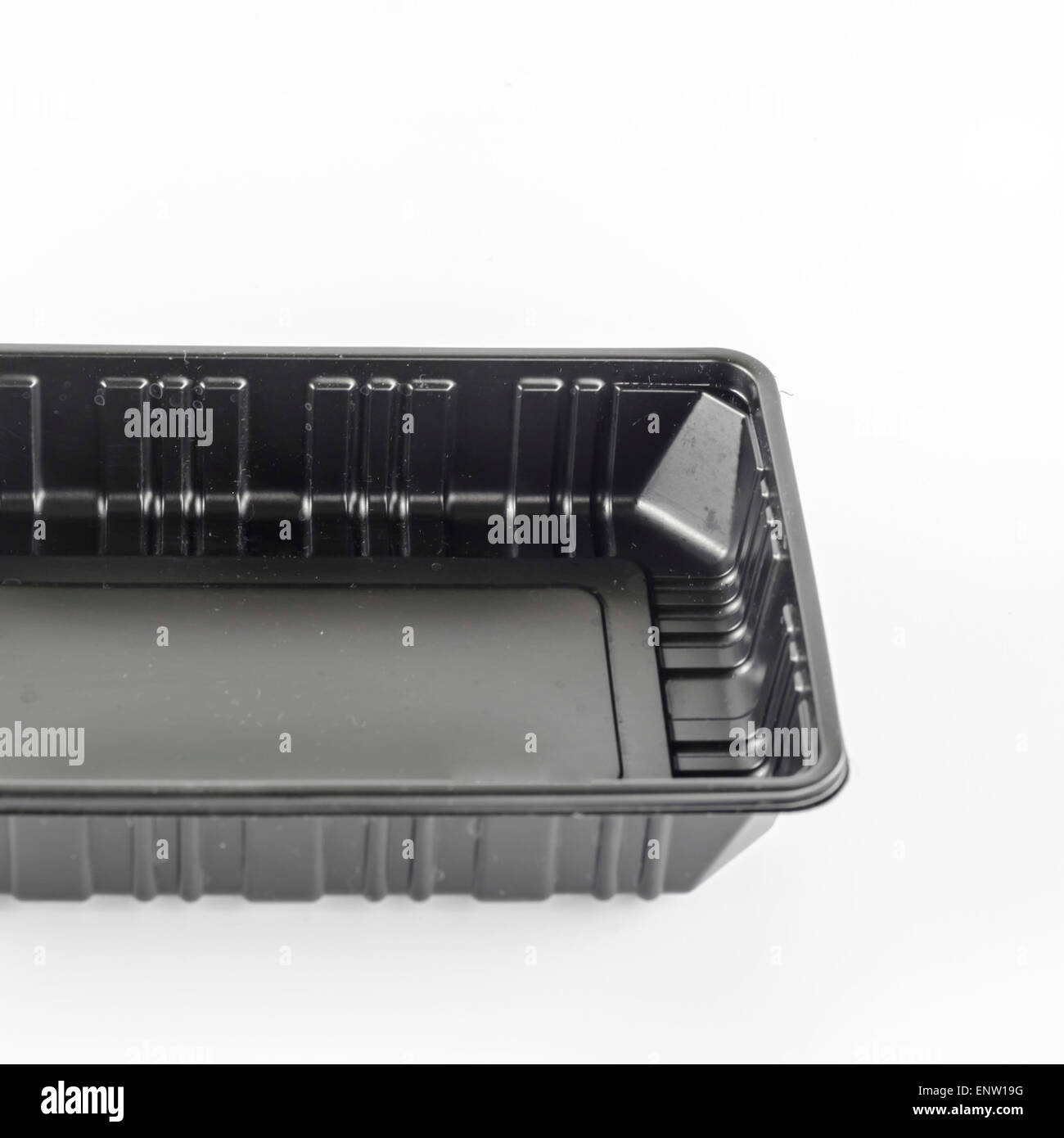 black plastic tray on a white background Stock Photo - Alamy