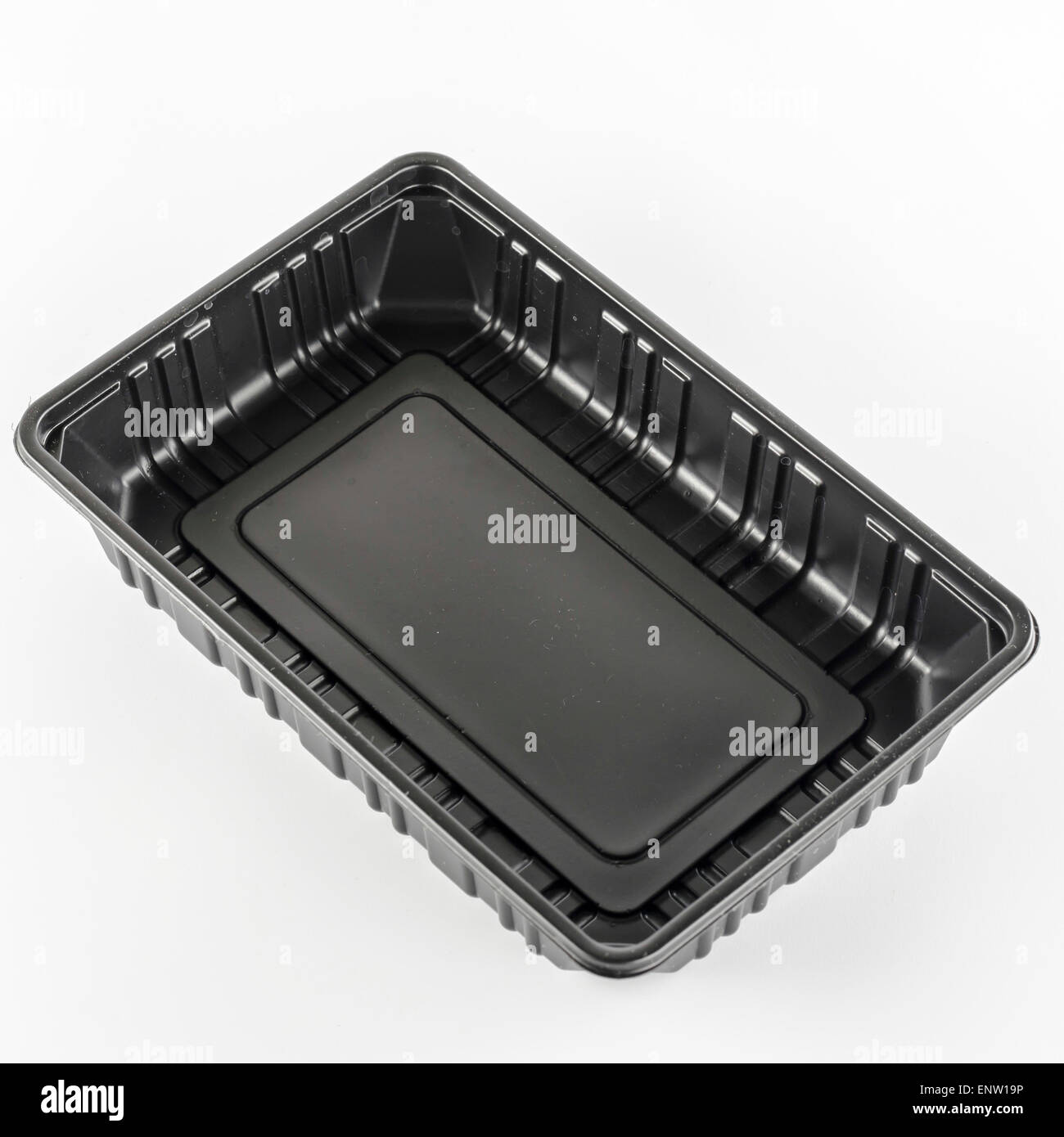 black plastic tray on a white background Stock Photo - Alamy