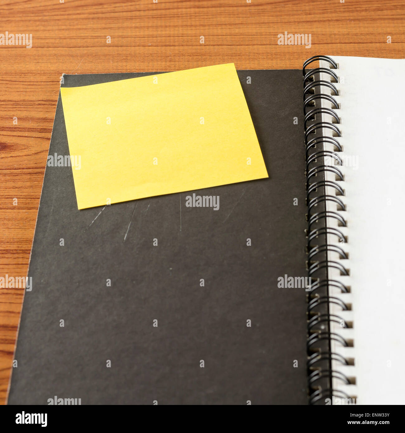 open notebook with post it on wood background Stock Photo - Alamy