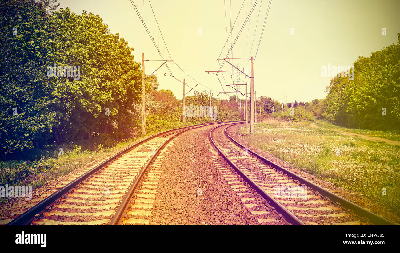 Vintage retro filtered picture of railroad tracks, old film effect ...