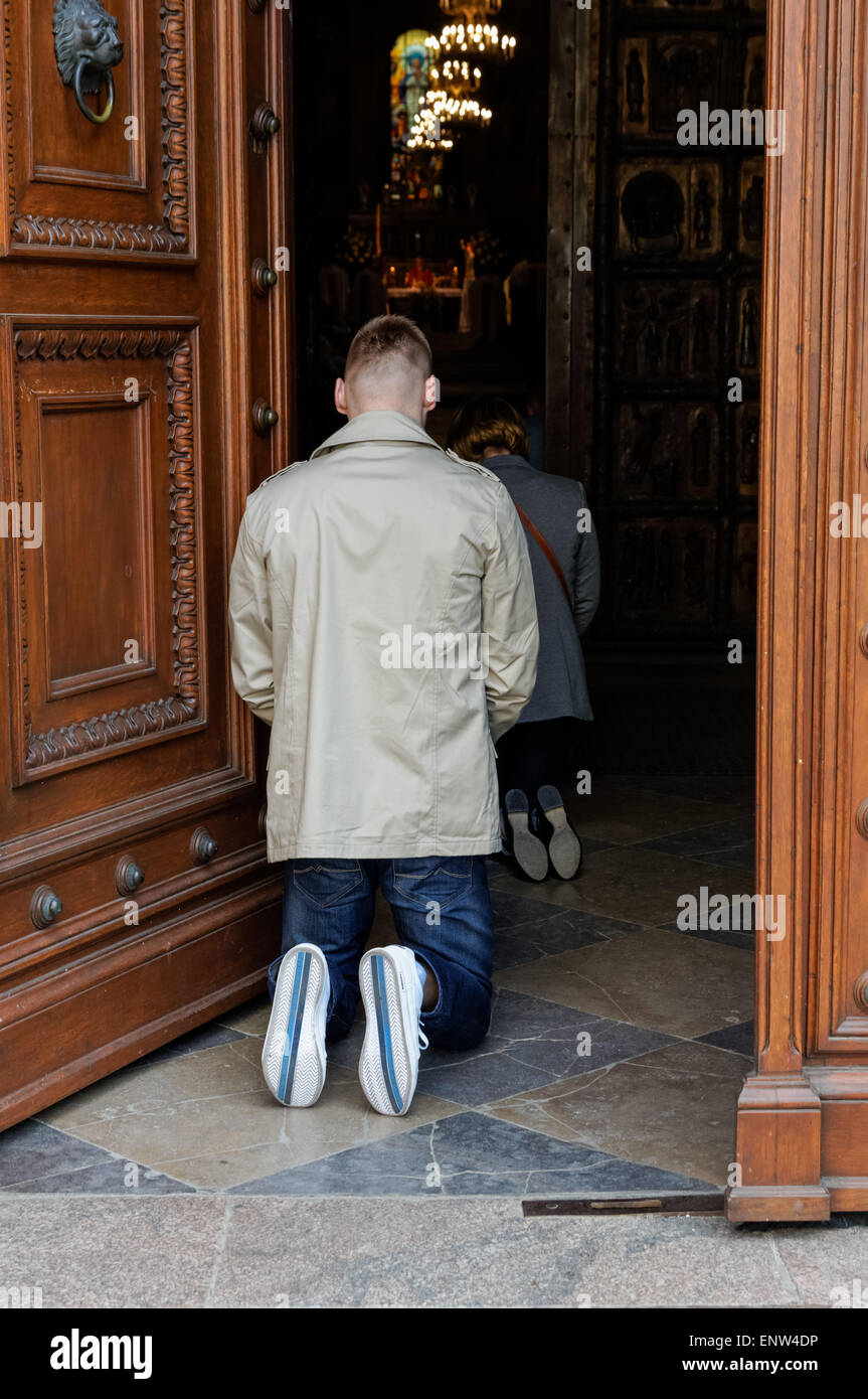 Praying inside catholic church hi-res stock photography and images - Alamy