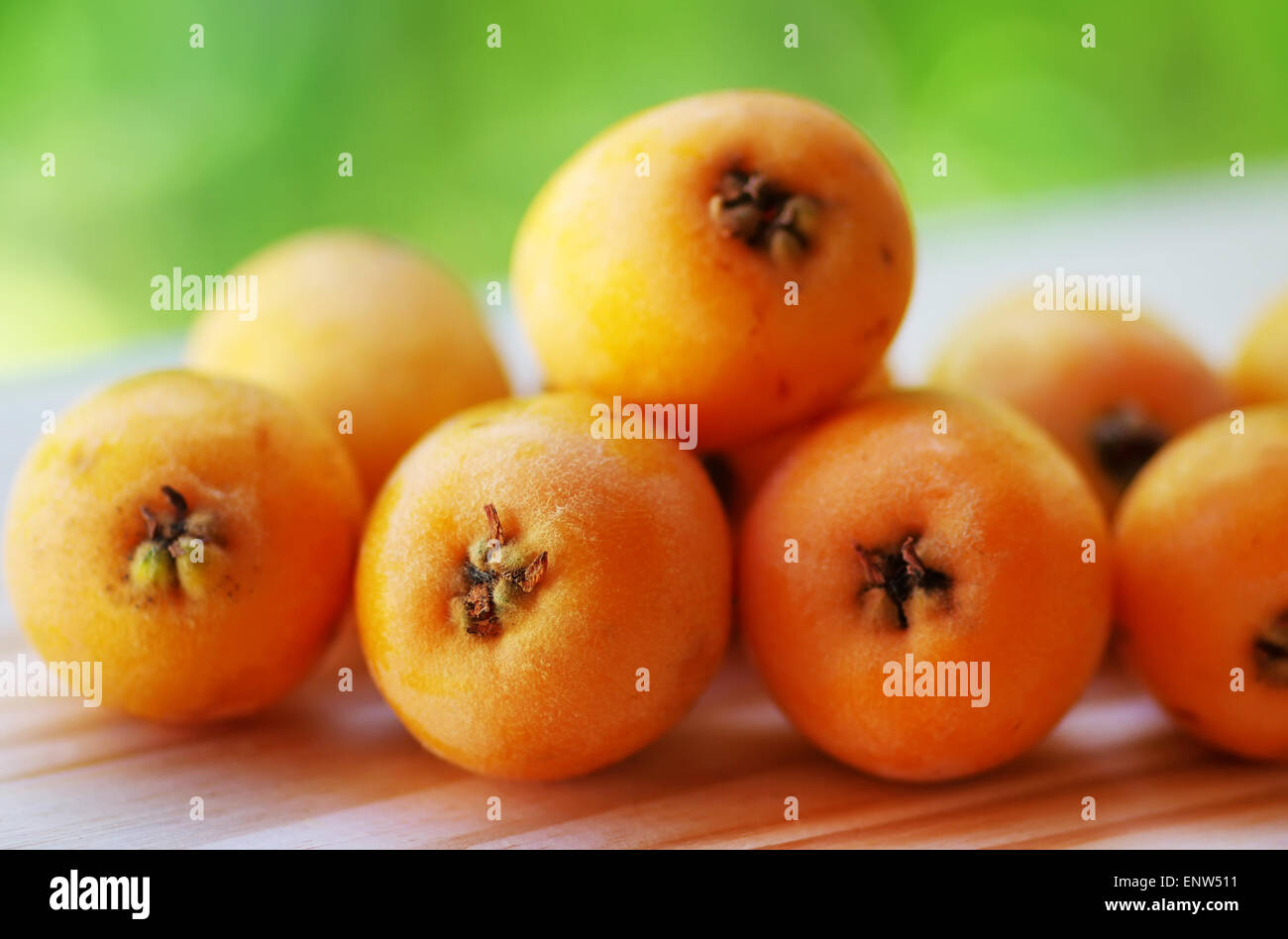 nispero, Japanese medlar fruit, on table Stock Photo - Alamy