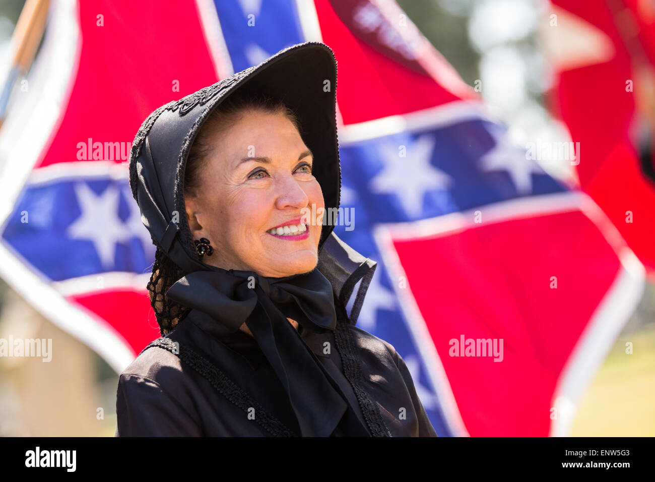 A woman dressed in civil war mourning costume sings Dixie during a ...