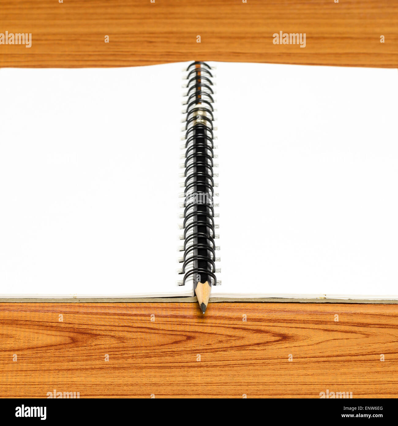 notebook and pencil on wood background Stock Photo - Alamy