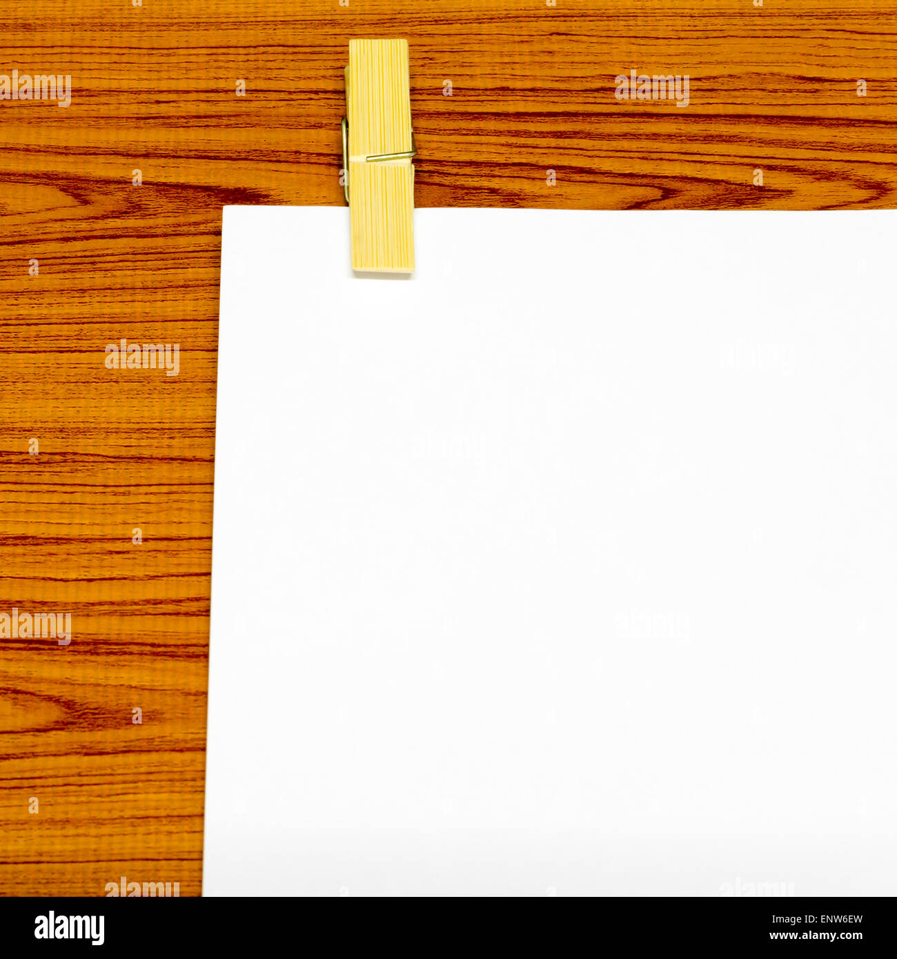 wooden pin paper on wood background Stock Photo - Alamy