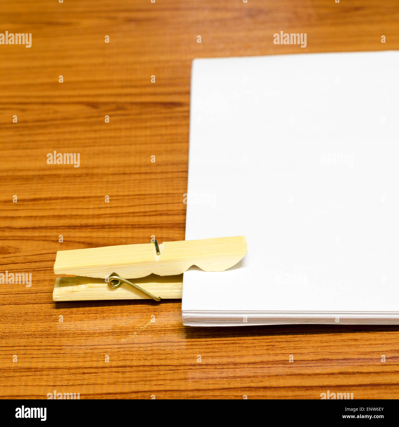 wooden pin paper on wood background Stock Photo - Alamy