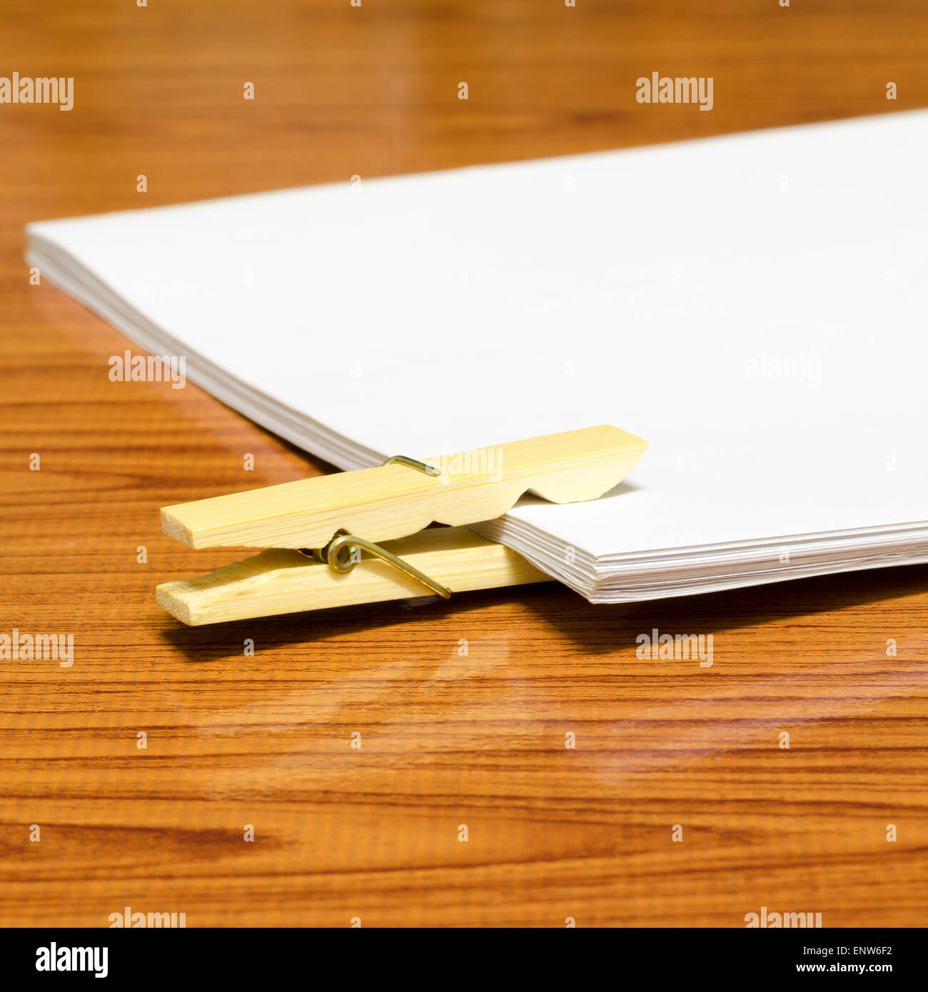 wooden pin paper on wood background Stock Photo - Alamy