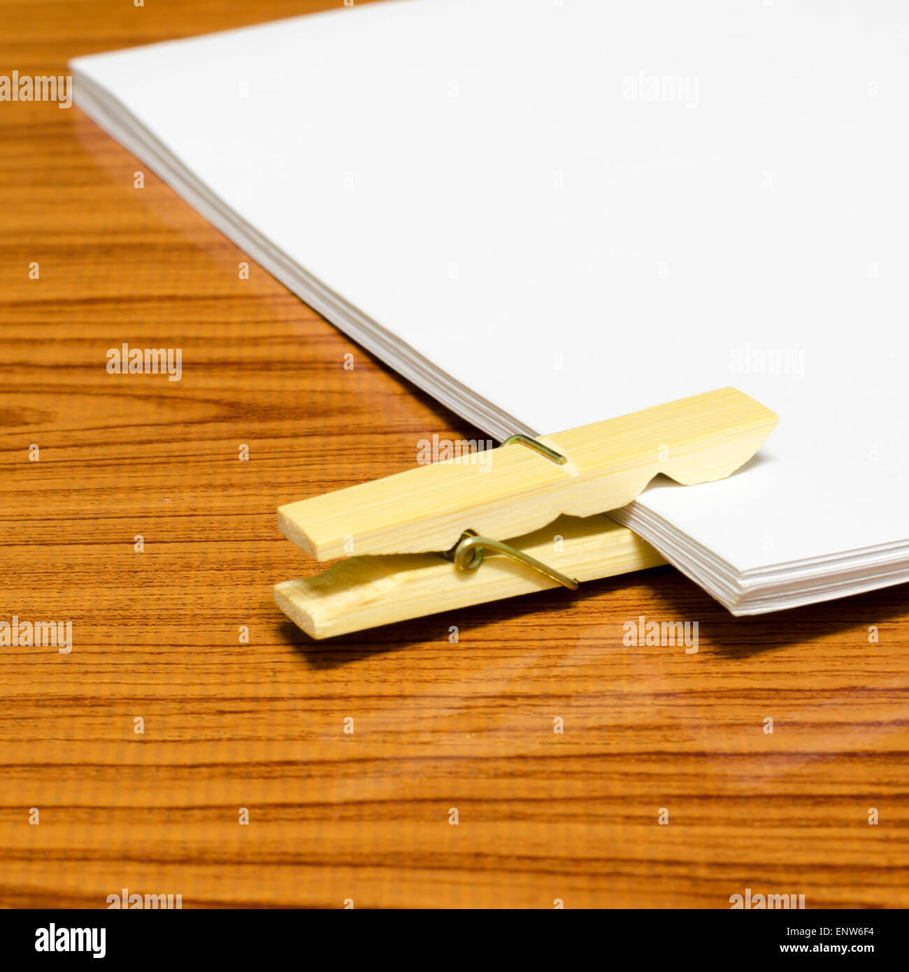 wooden pin paper on wood background Stock Photo - Alamy