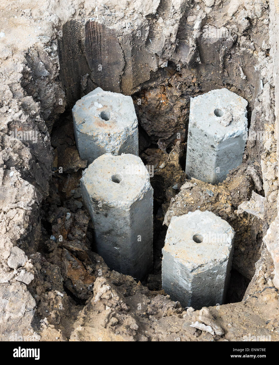 Concrete stake in the hole of construction house Stock Photo - Alamy