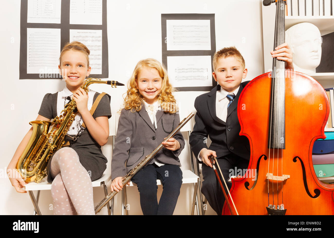Boy playing musical instruments hi-res stock photography and images - Alamy
