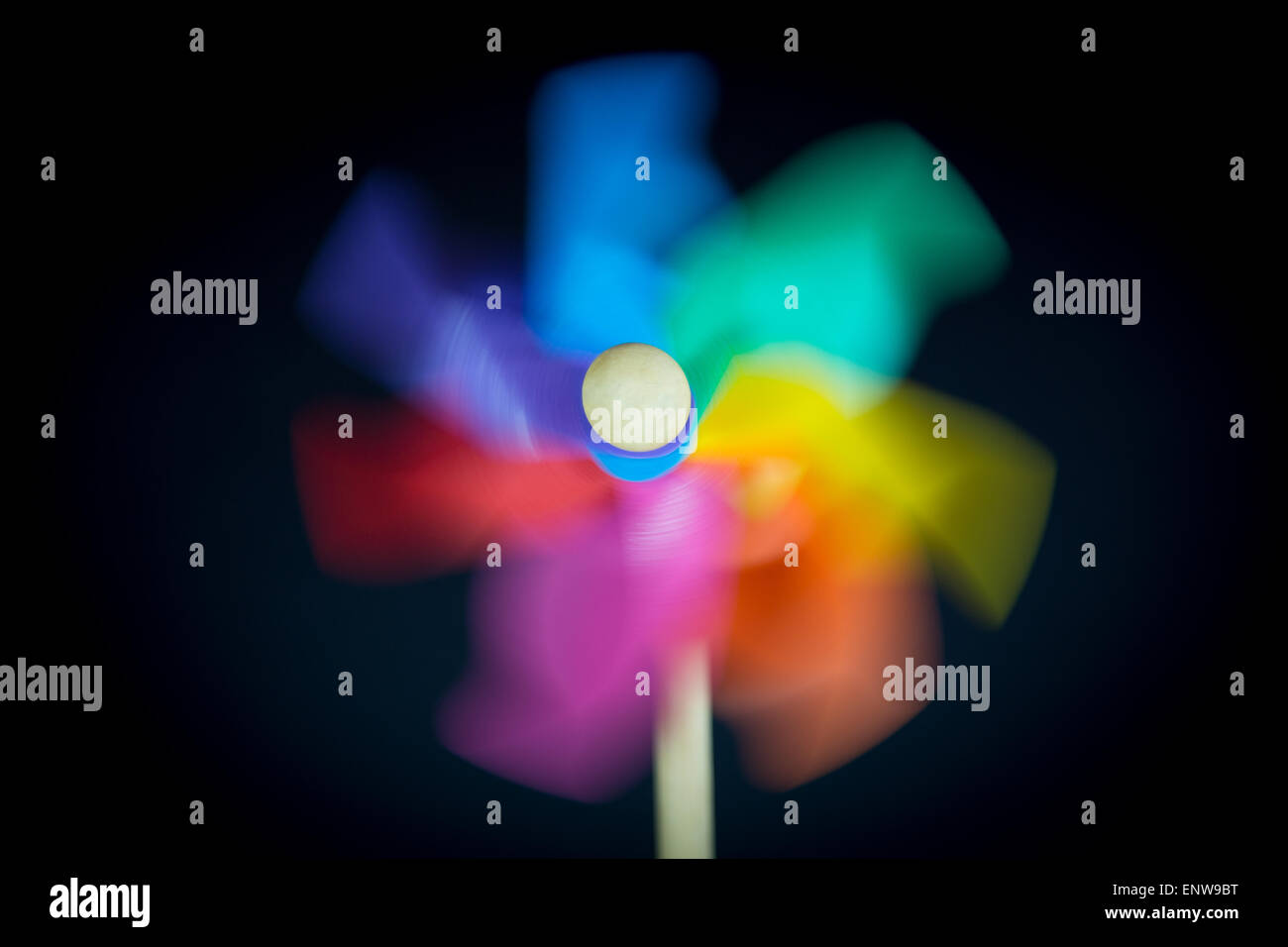 Colorful pinwheel photographed on a black background Stock Photo - Alamy