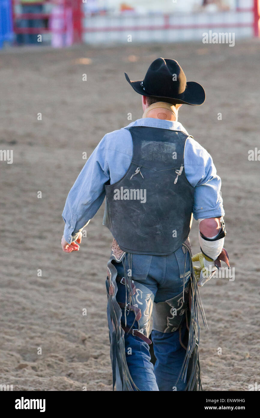 Professional cowboy Brian Leddy walking after bareback riding at the ...