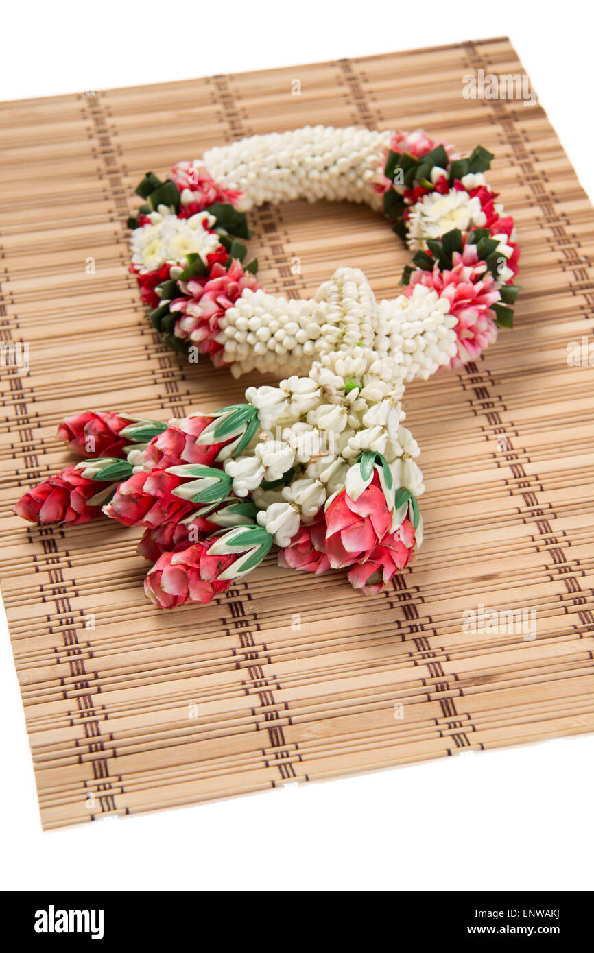 Thai traditional craft flower garland on wood background Stock Photo ...