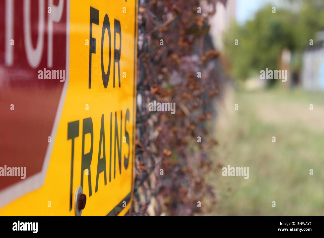 Sign to Stop for Trains Stock Photo - Alamy