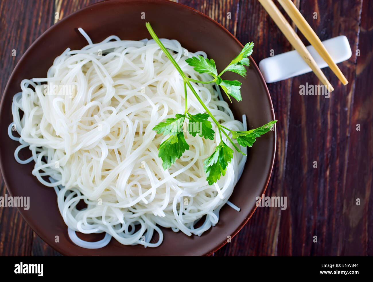 rice noodles on plate and on a table Stock Photo - Alamy
