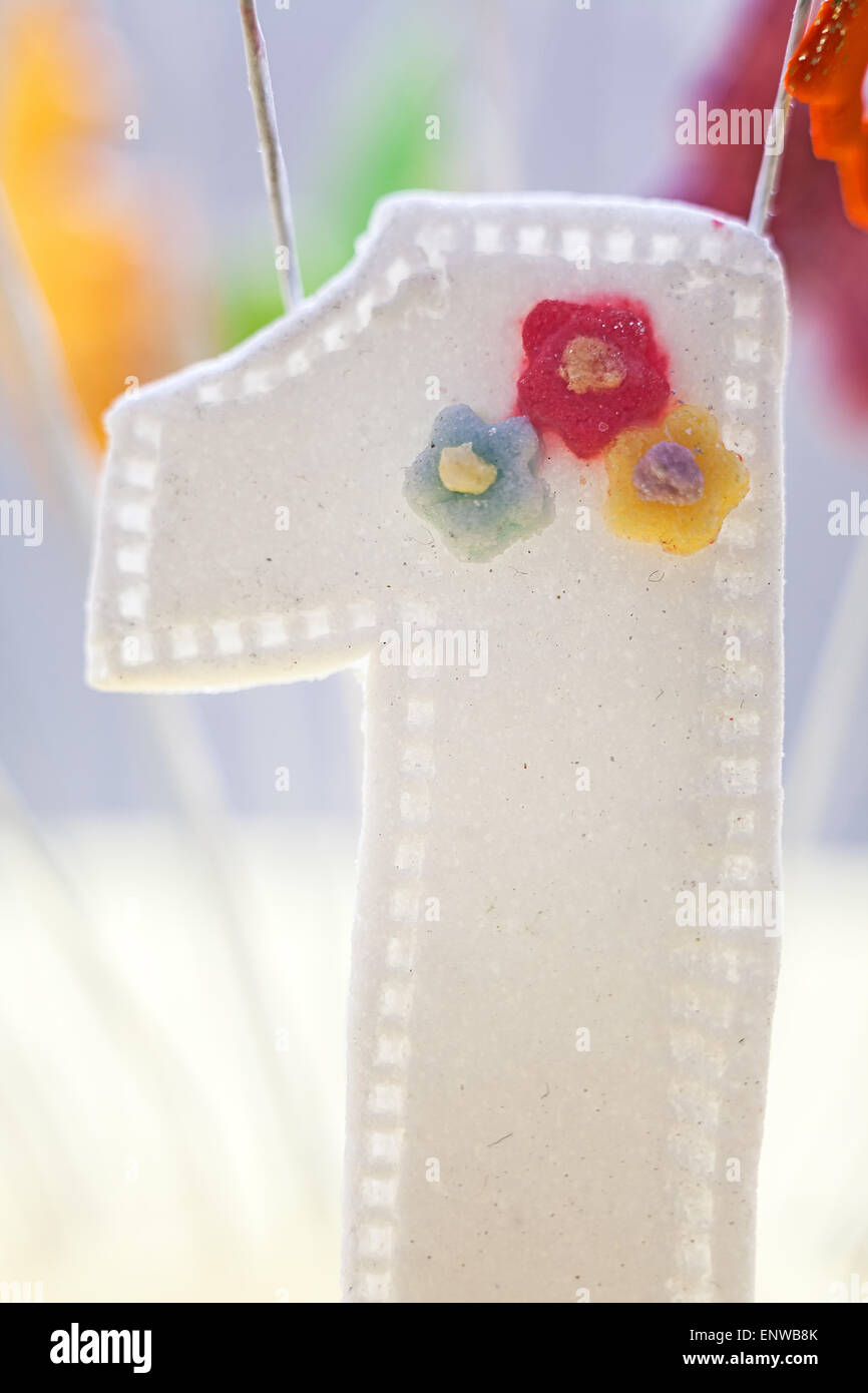 Number one made of sugar as part of birthday cake decoration Stock ...