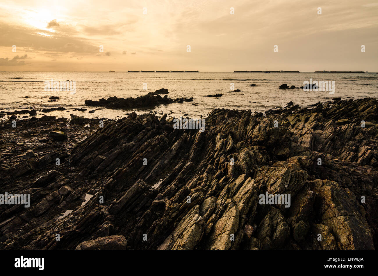 Rock and sea morning light in Thailand Stock Photo - Alamy