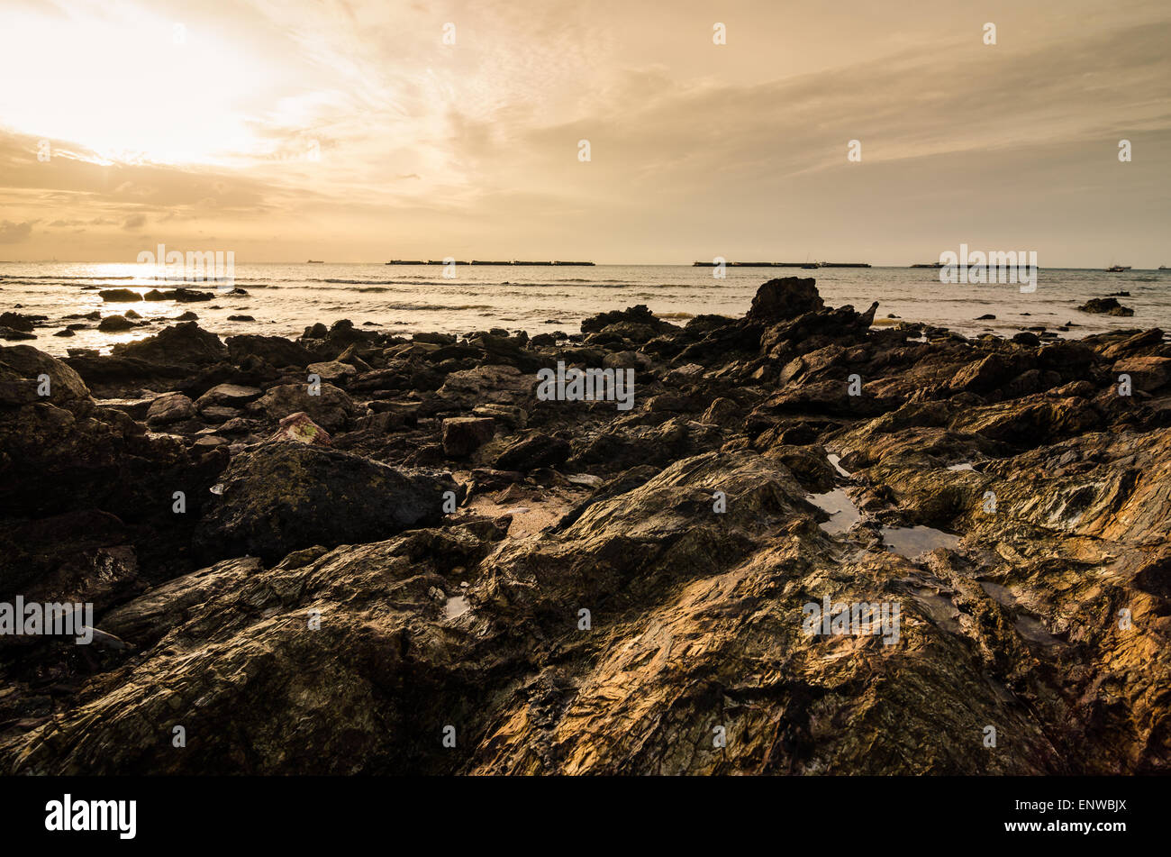 Rock and sea morning light in Thailand Stock Photo - Alamy