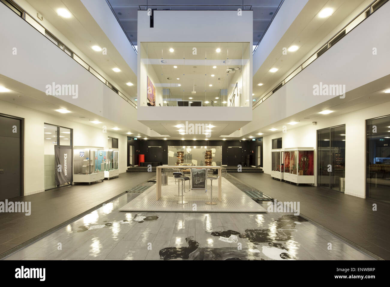 Atrium with water feature and seating area, with seminar room suspended ...