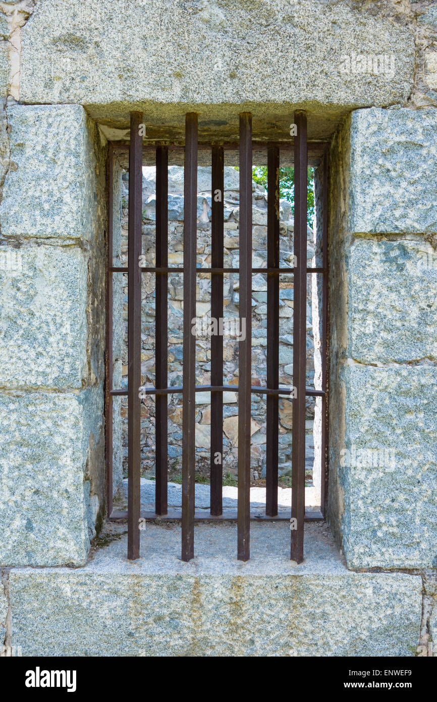 Iron grate window cell on a exterior wall of an aging jail Stock Photo ...