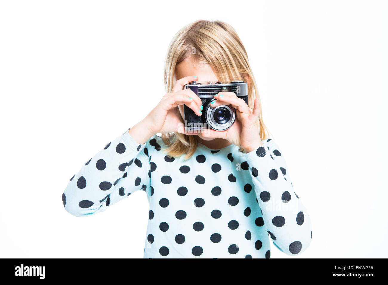 Girl photographing with an old film camera Stock Photo - Alamy