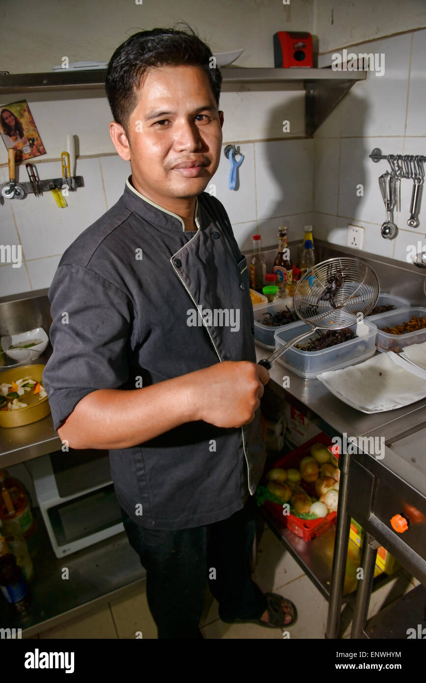 Chef with a tarantula at the Bug Cafe in Siem Reap, Cambodia Stock ...