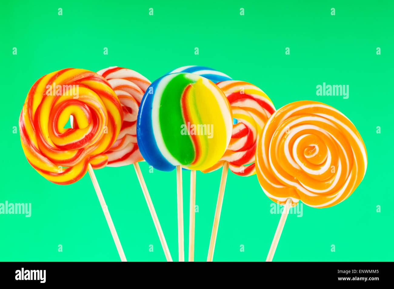 Colourful lollipop against the colourful background Stock Photo - Alamy