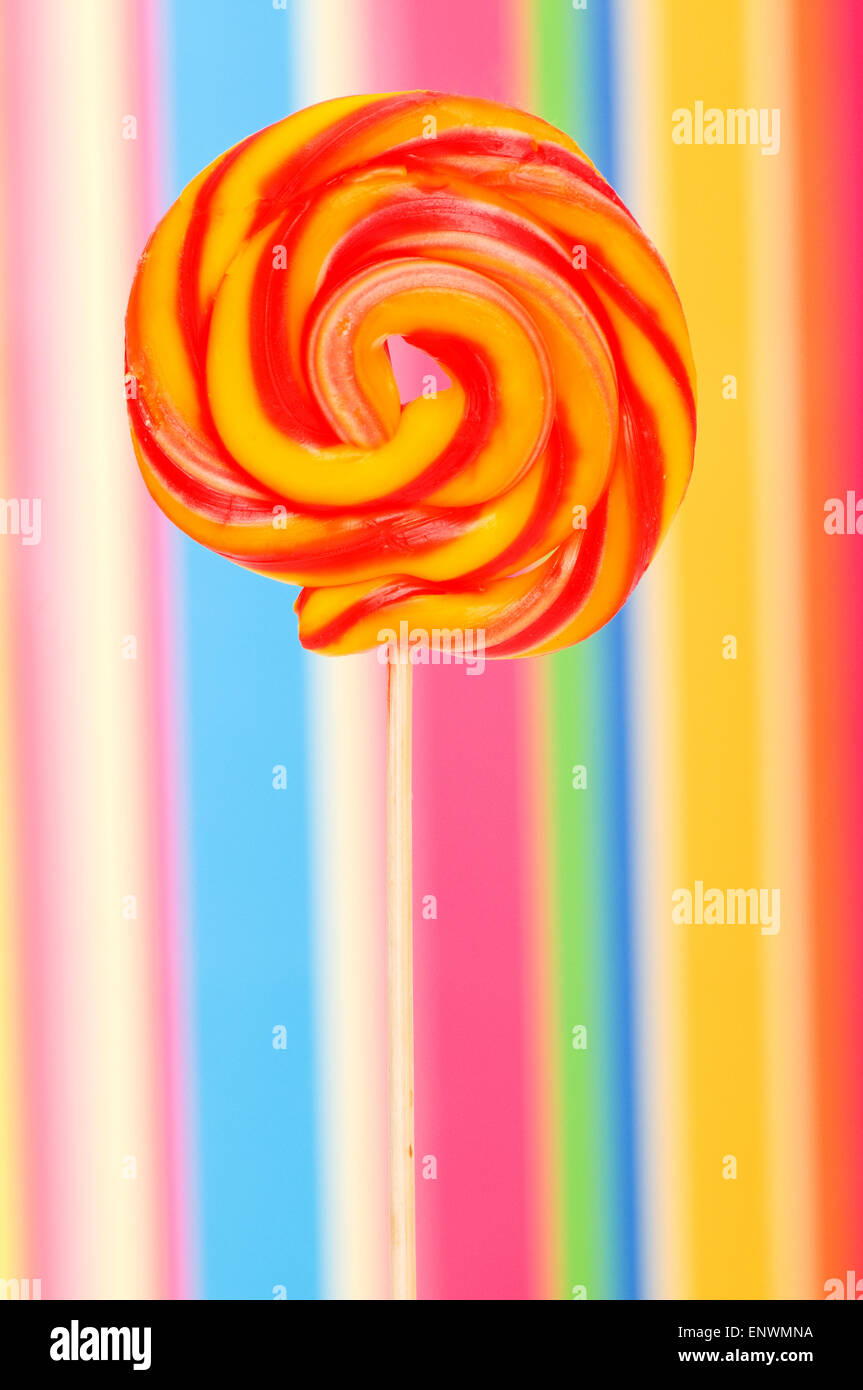 Colourful lollipop against the colourful background Stock Photo - Alamy
