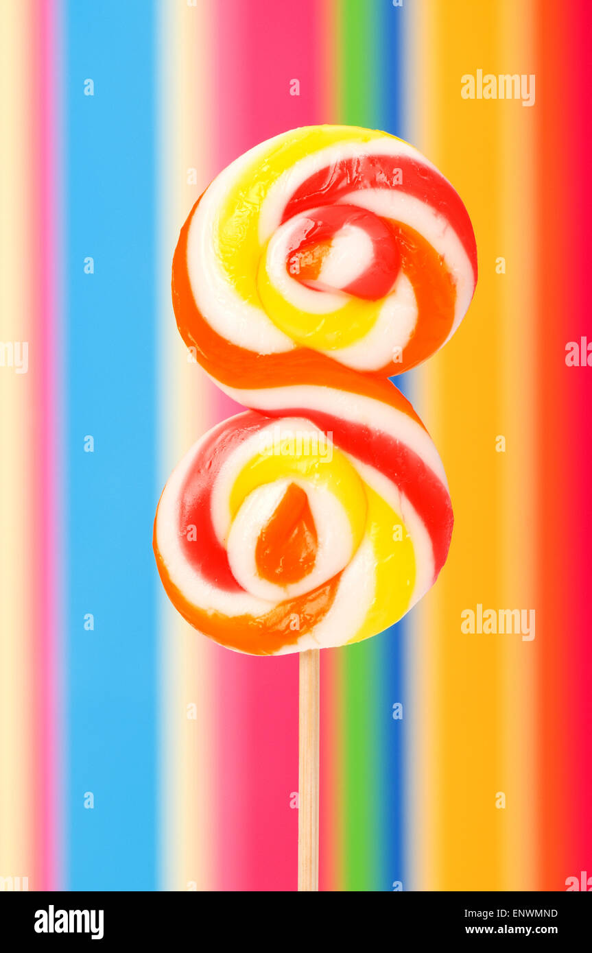 Colourful lollipop against the colourful background Stock Photo - Alamy