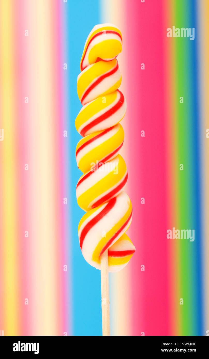Colourful lollipop against the colourful background Stock Photo - Alamy