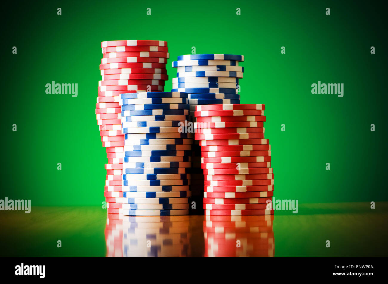 Stack of casino chips against gradient background Stock Photo - Alamy