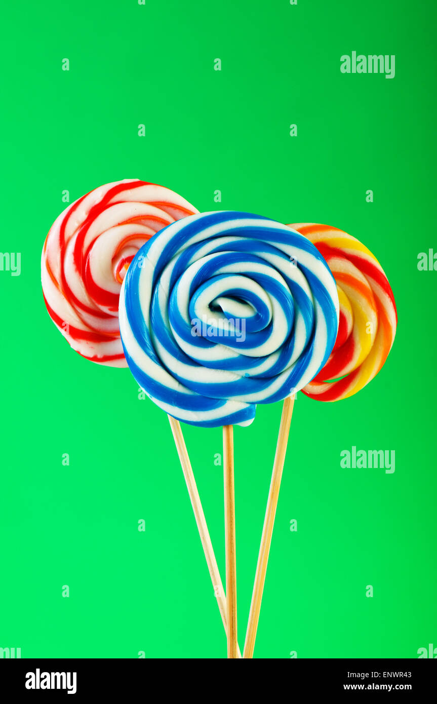 Colourful lollipop against the colourful background Stock Photo - Alamy