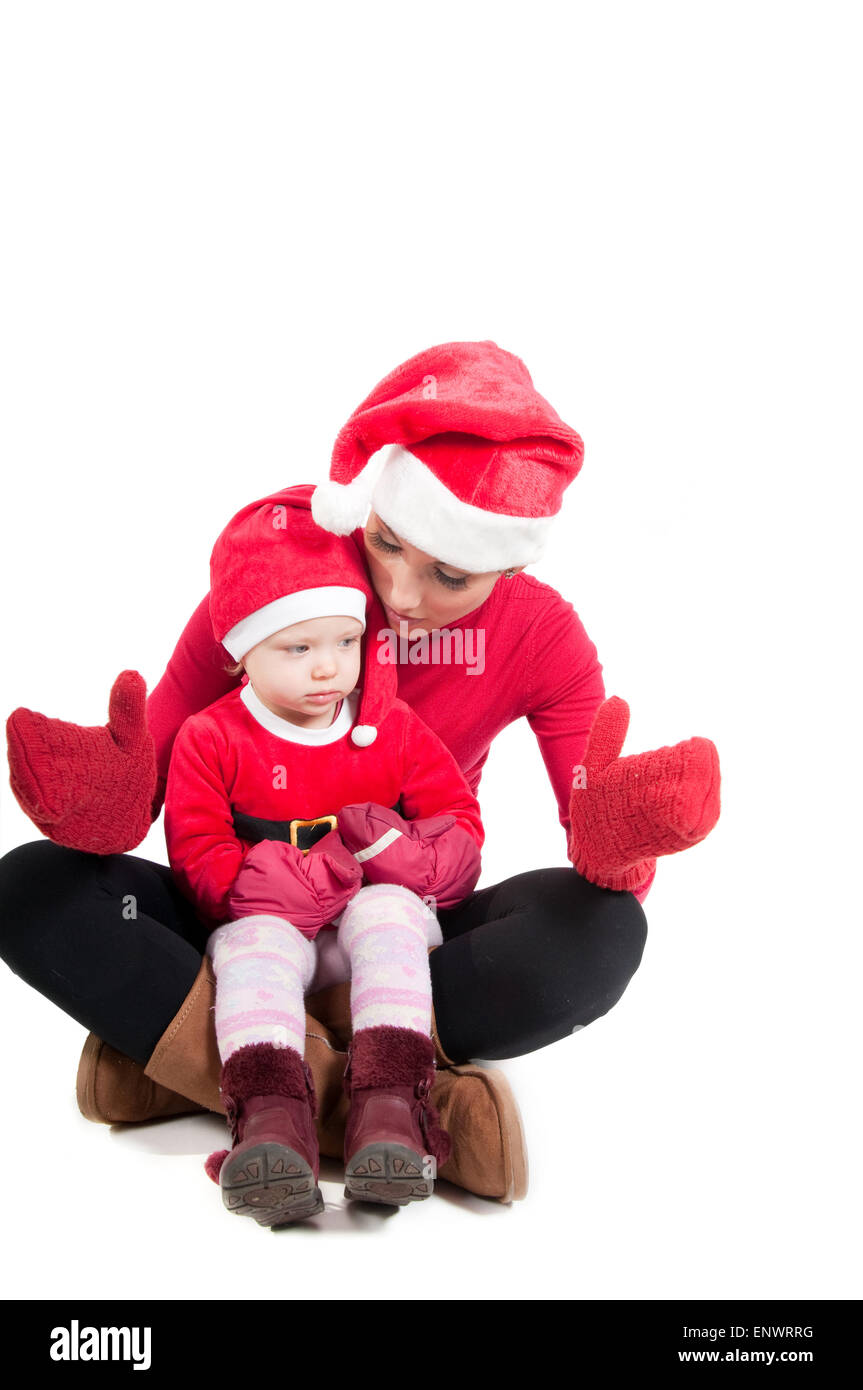 Santa mother and daughter in studio Stock Photo - Alamy