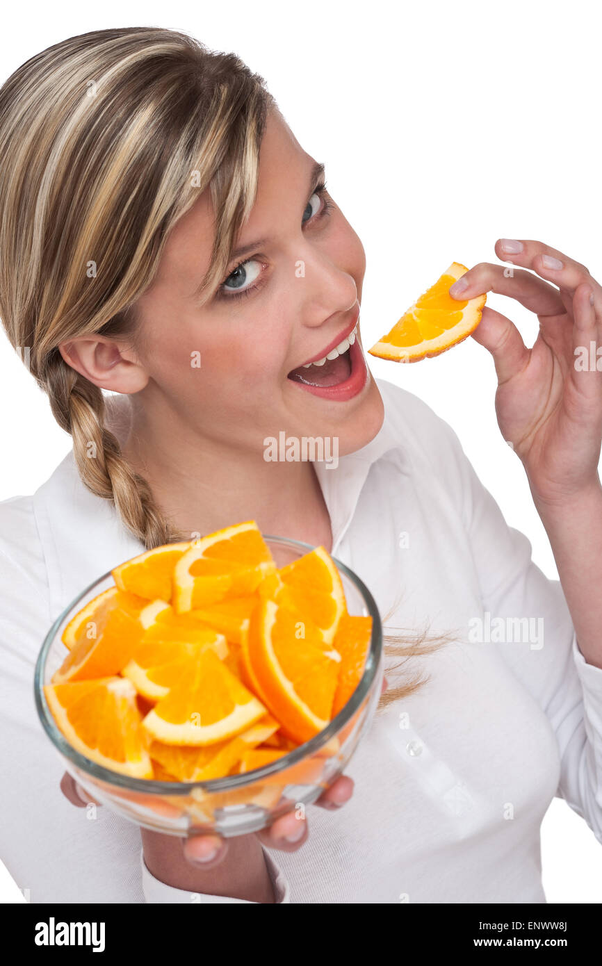 Healthy lifestyle series - Woman eating orange Stock Photo - Alamy